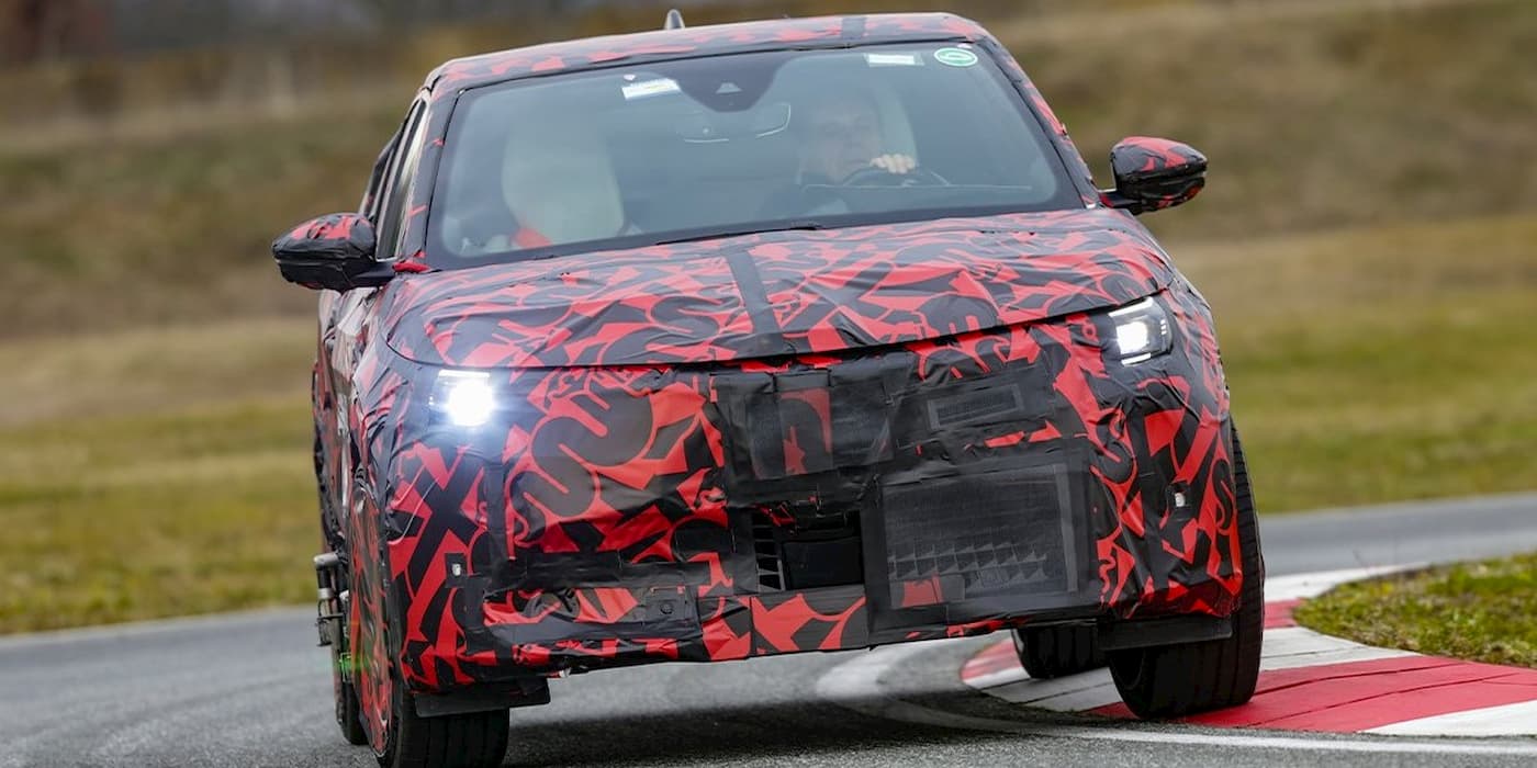 Alfa Romeo's first EV looks like an Italian icon in red camo