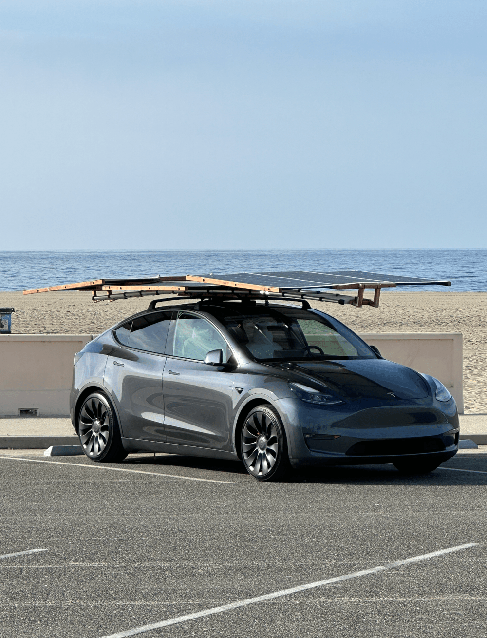Tesla owner builds his own deployable solar roof for Model Y | Electrek