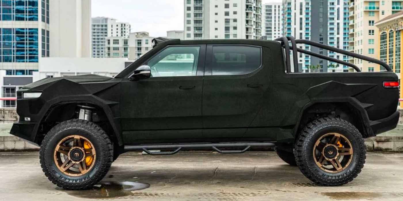 This custom Rivian has been fit with a lift kit, kevlar paint, roll cage