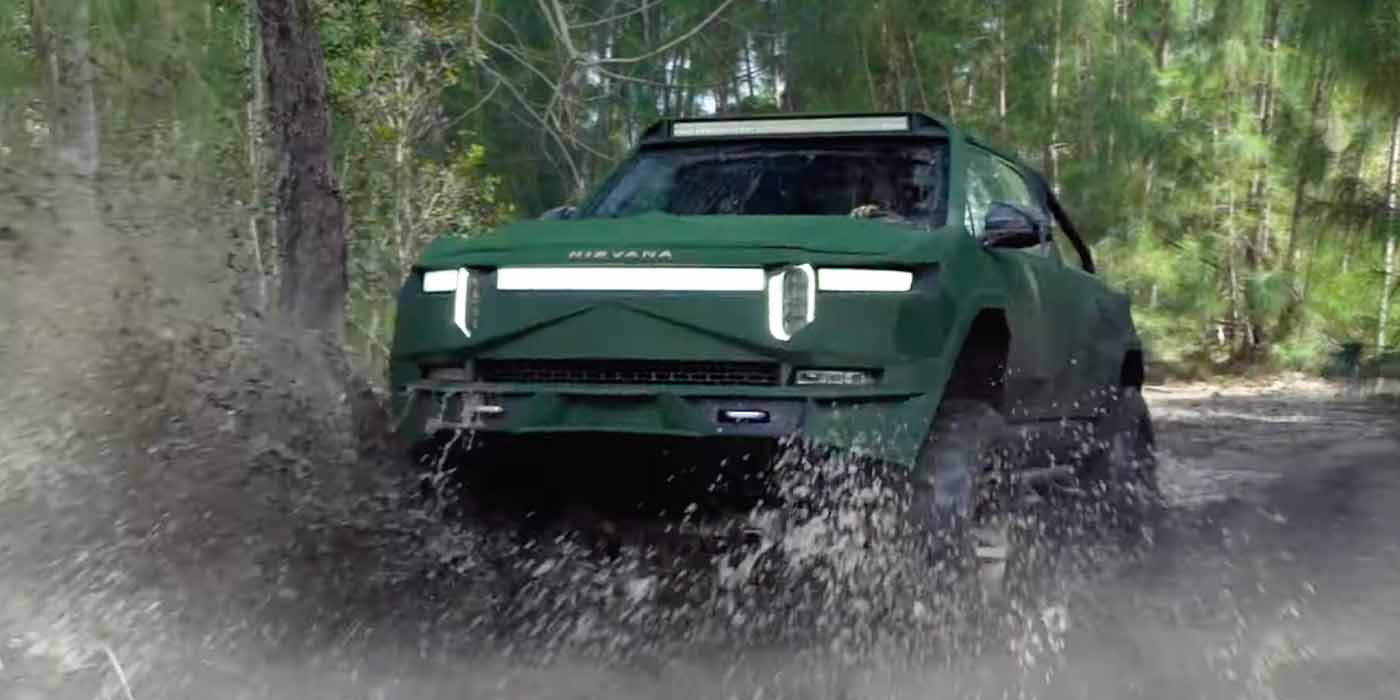 This custom Rivian has been fit with a lift kit, kevlar paint, roll cage