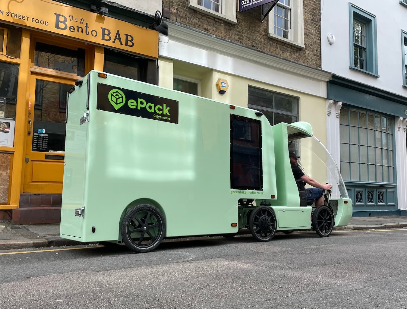 This new cargo e-bike is so big it has 6 wheels & looks like a truck