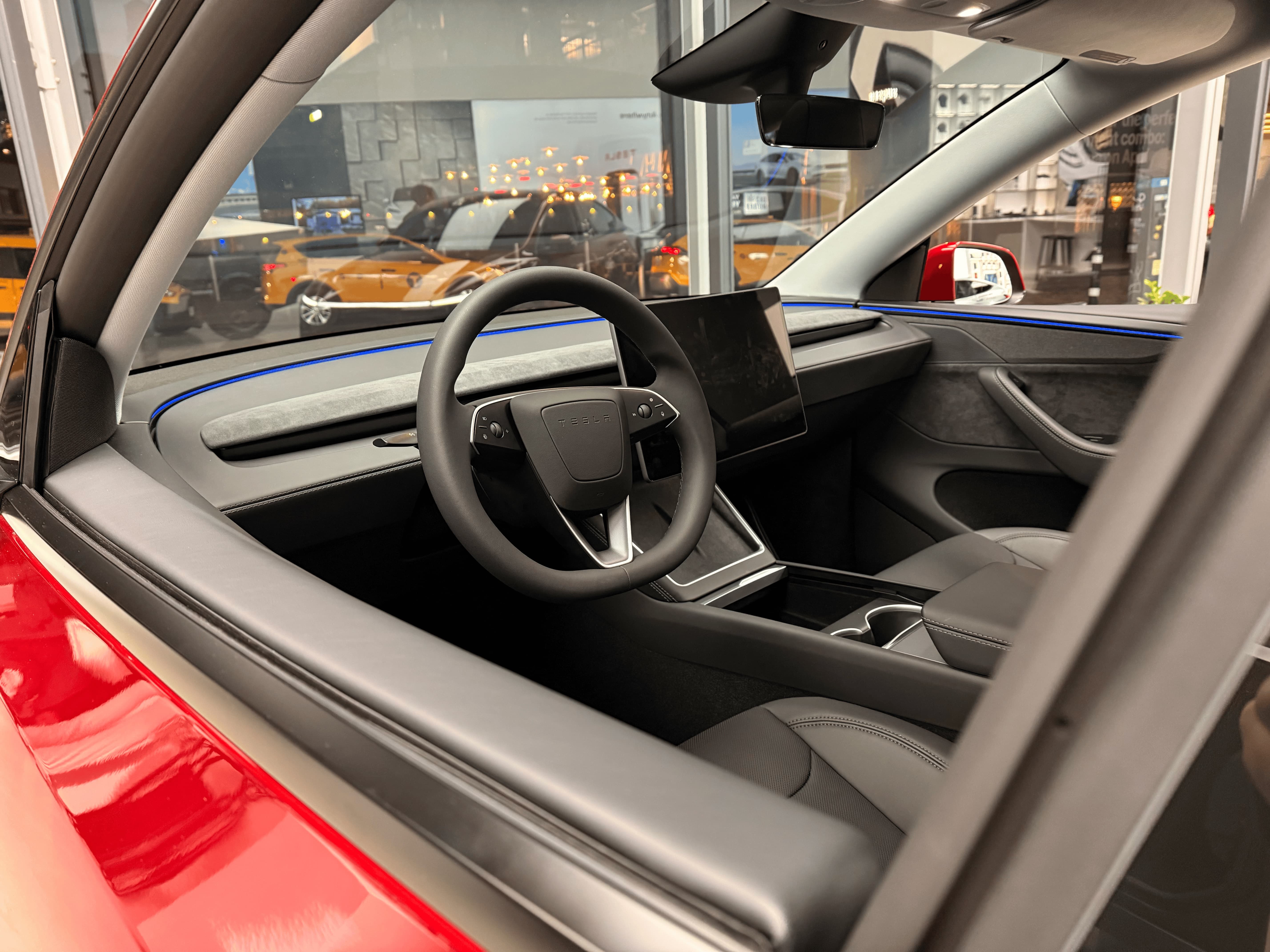 Here's an up-close look at the new Tesla Model Y, now in 17 showrooms ...