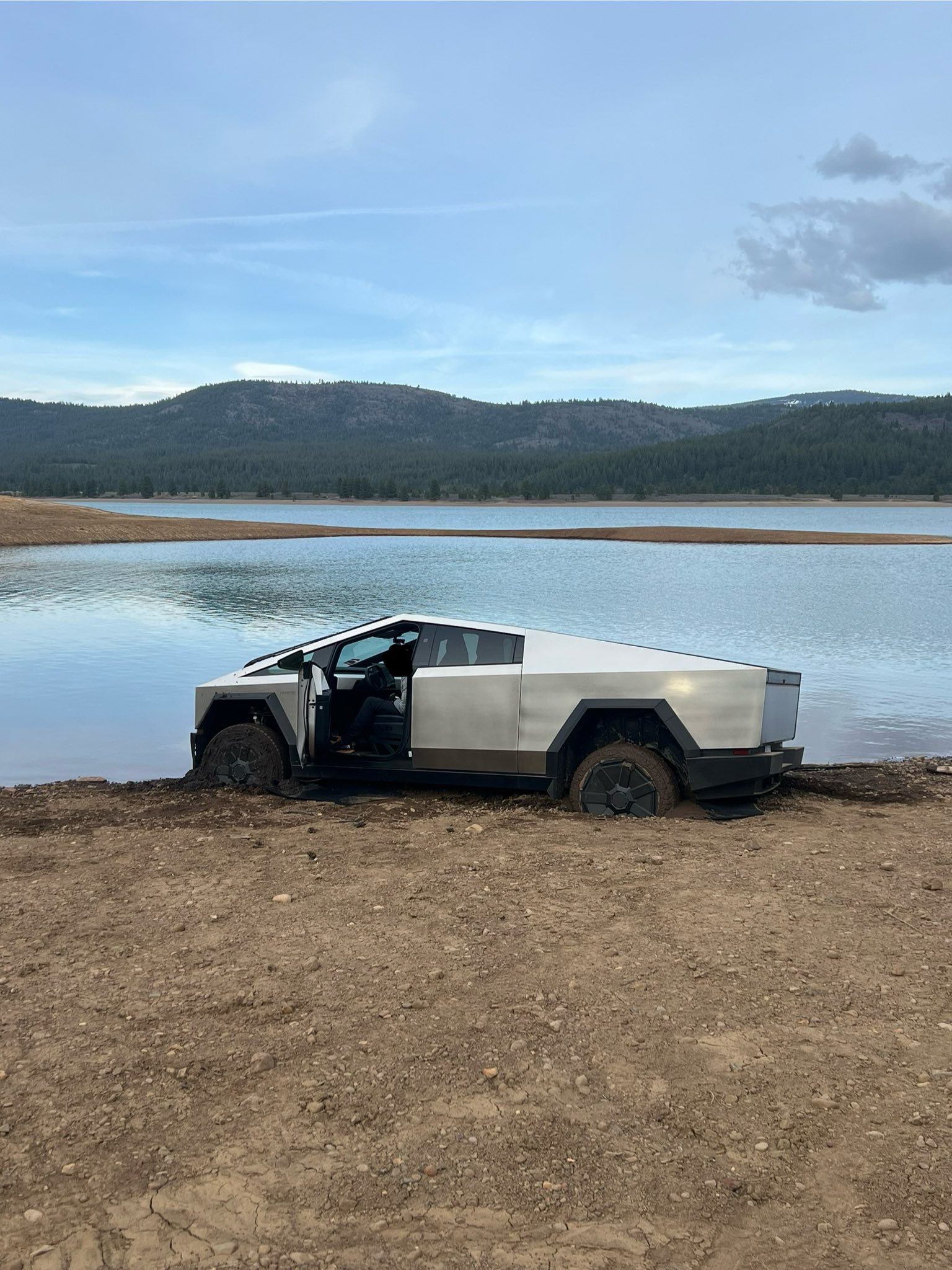 Tesla Cybertruck owner gets stuck after believing Elon Musk's 'river ...