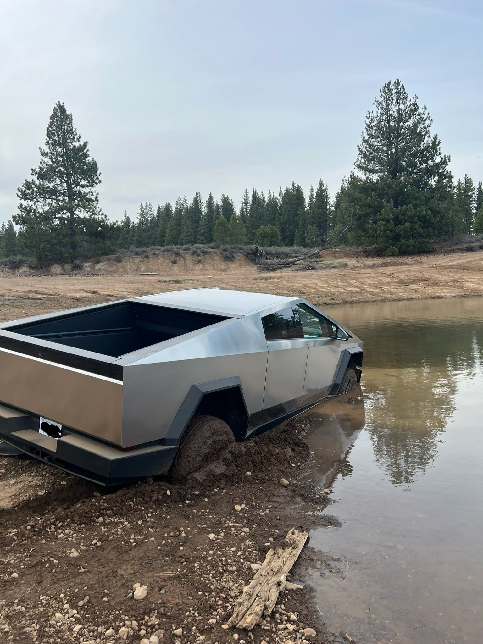 Tesla Cybertruck owner gets stuck after believing Elon Musk's 'river ...