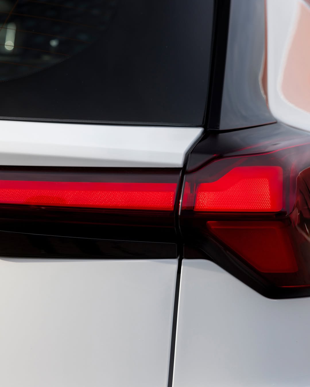 Chevy teases new Bolt w/NACS, front fascia redesign, rear brake lights ...