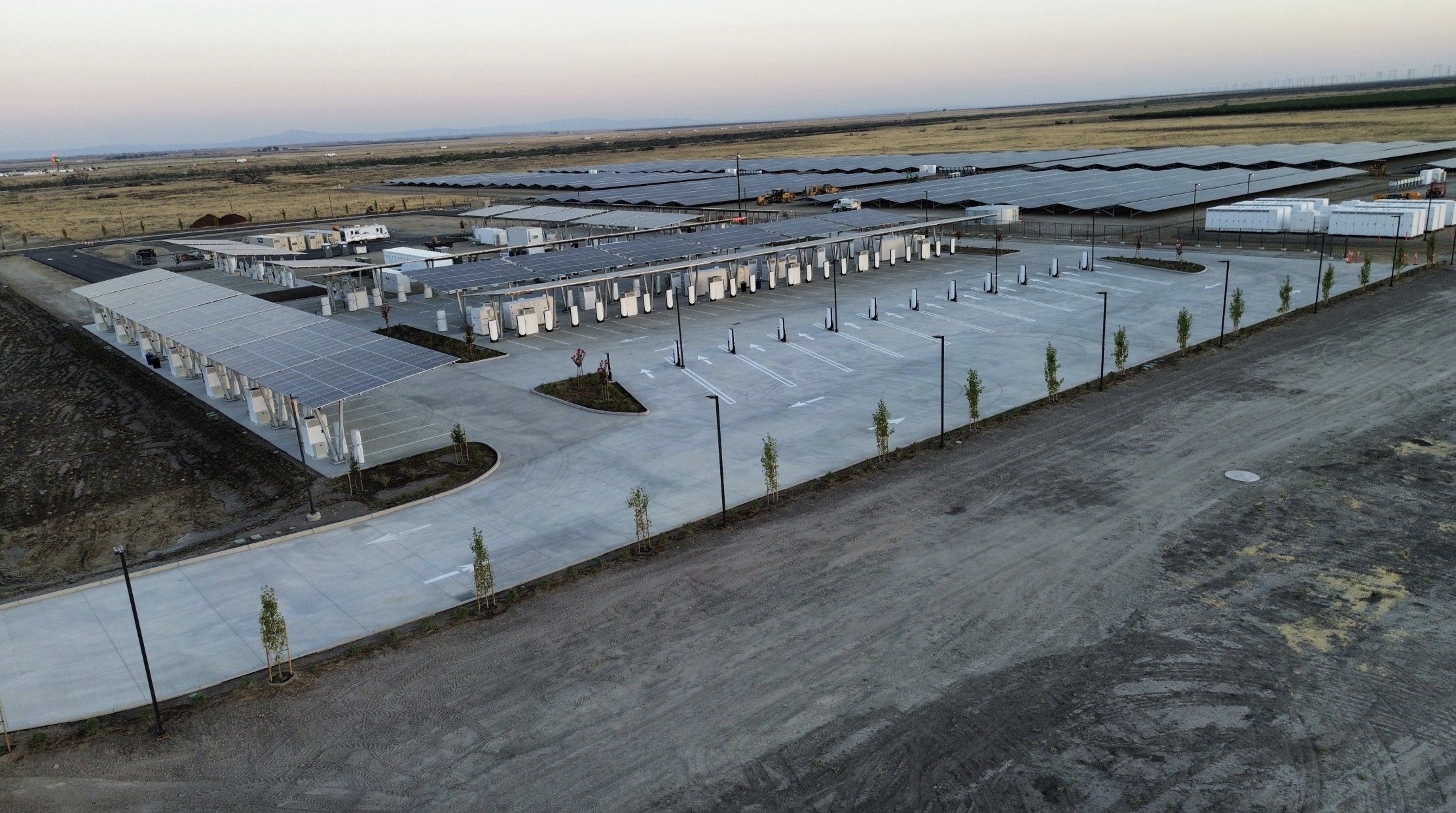 Tesla launches Oasis Supercharger with solar farm and off-grid ...