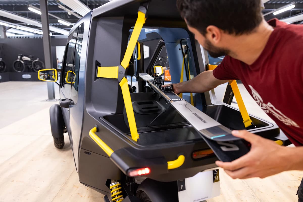 This 75 MPH electric car has functional bicycle pedals to charge it